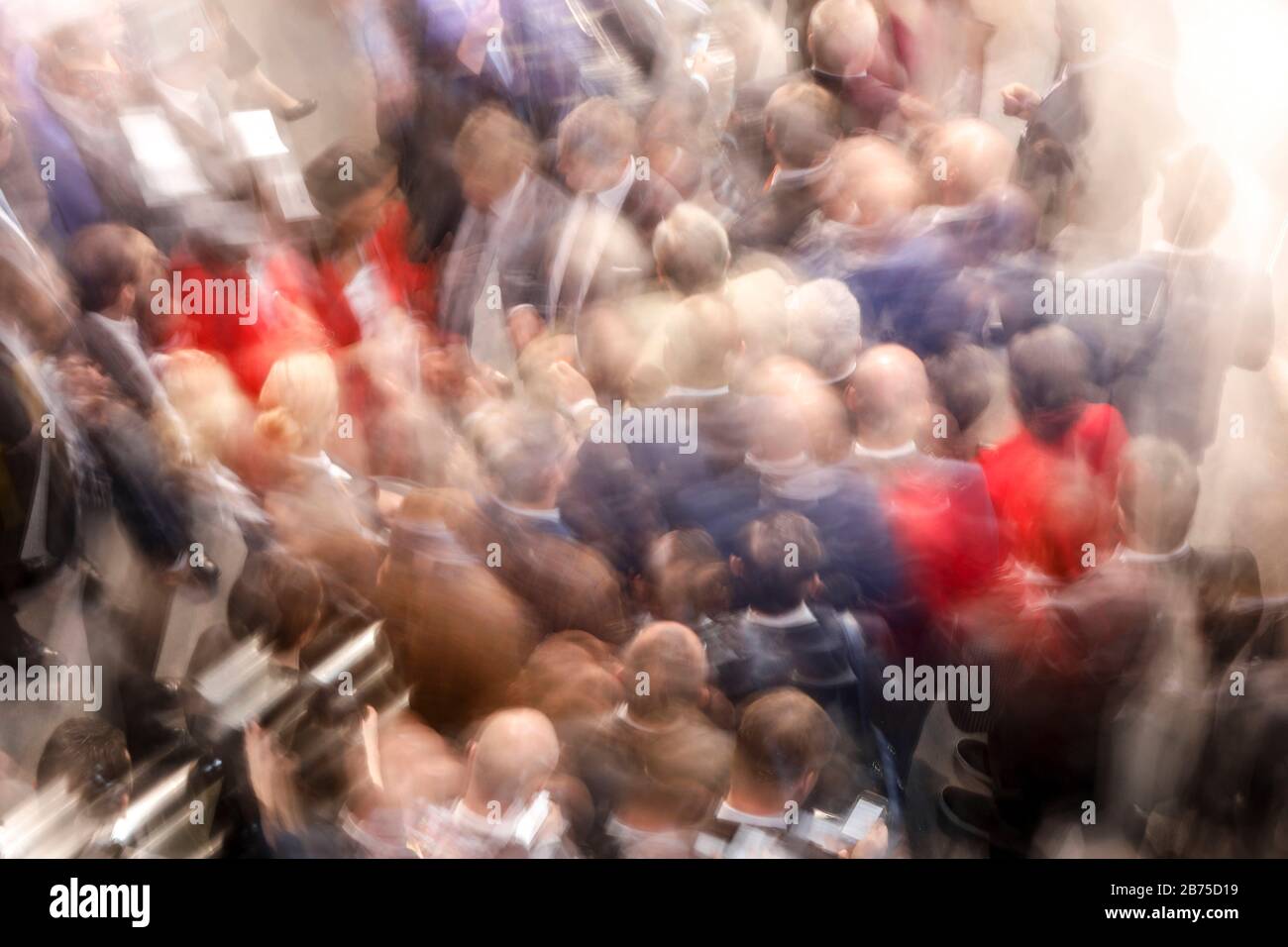 Blurred and blurred by a long exposure, members of the German Bundestag ...