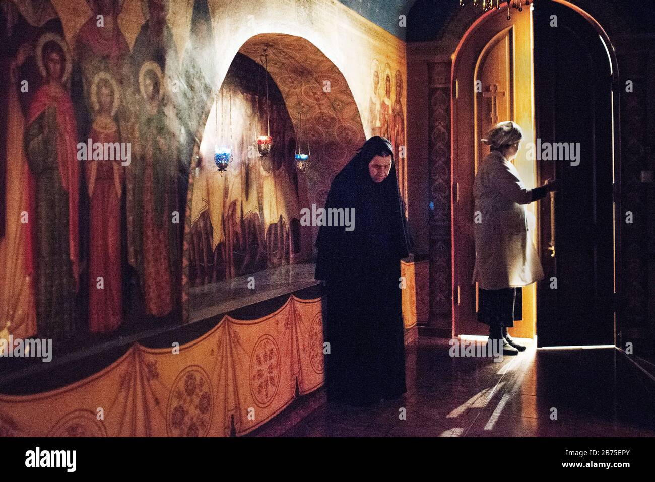 A nun is waiting to be raised to the highest level of monasticism, the ...