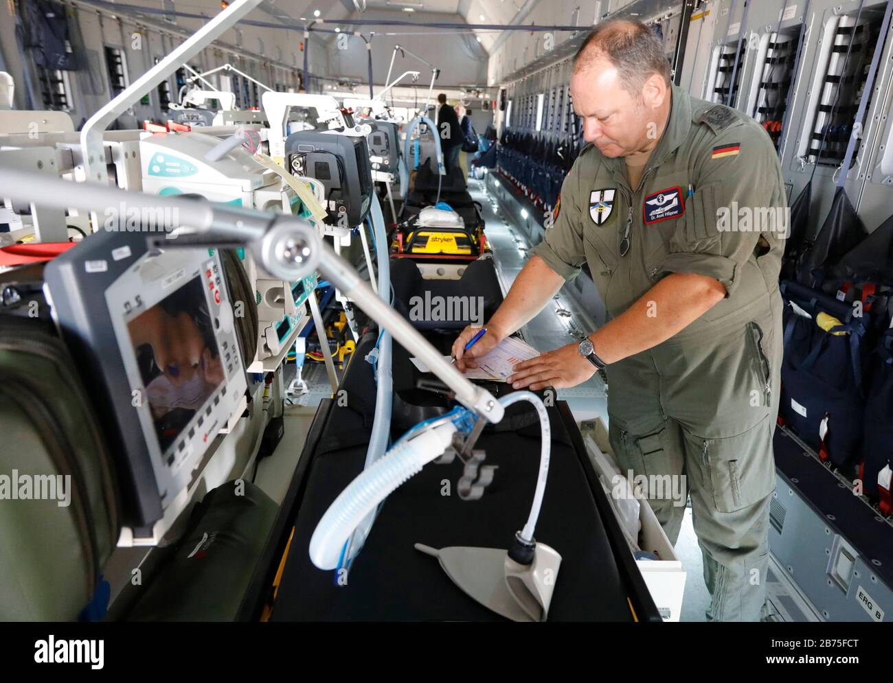 Bundeswehr physician on board an air force Airbus A400M with an ...