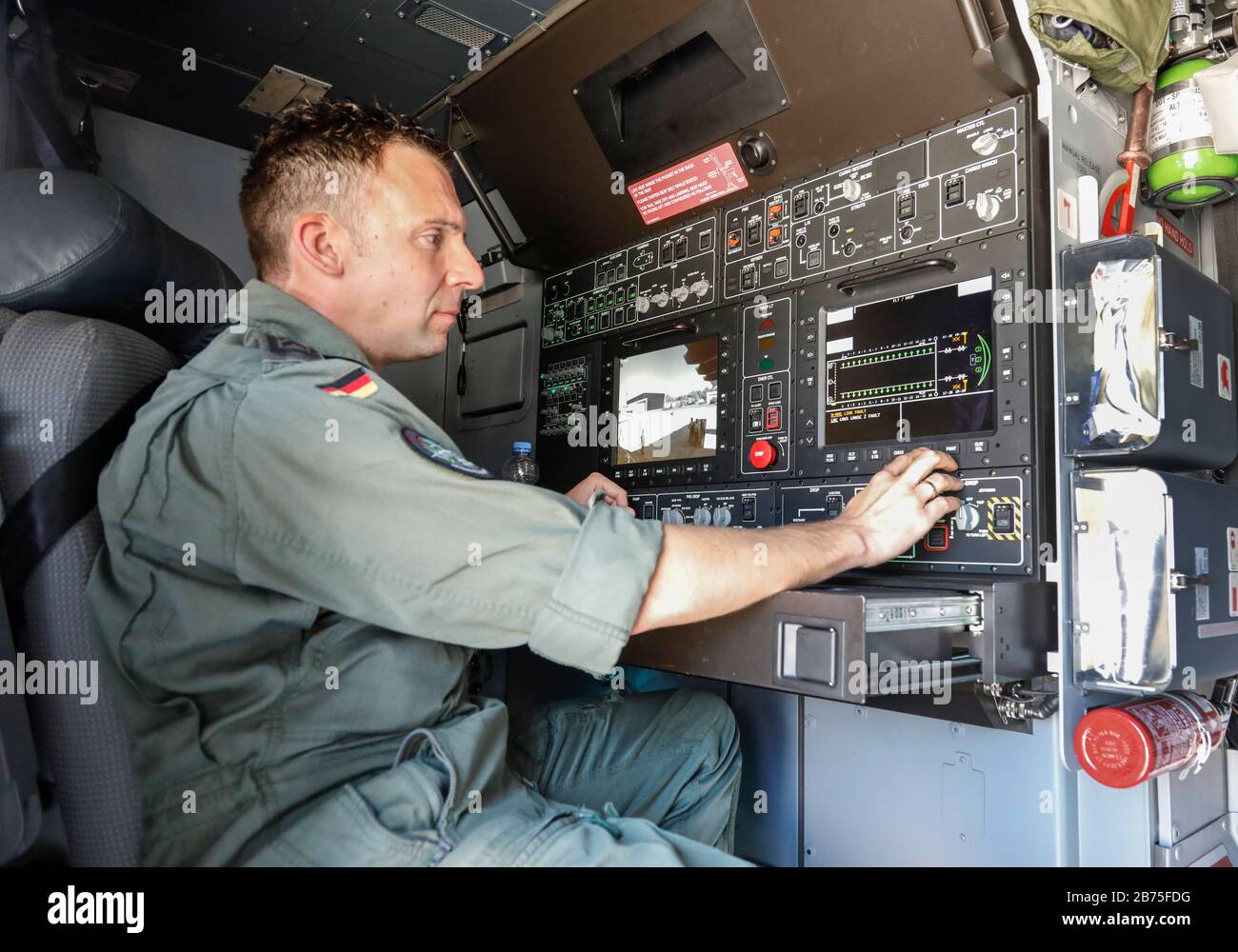 Loading master on board an air force Airbus A400M. [automated ...