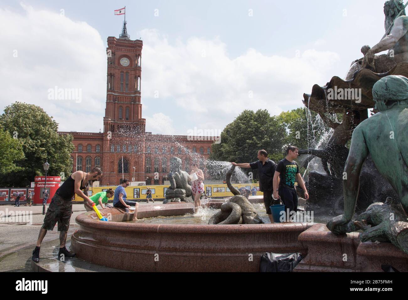 Water hungry participants of this year's water battle at Berlin's ...
