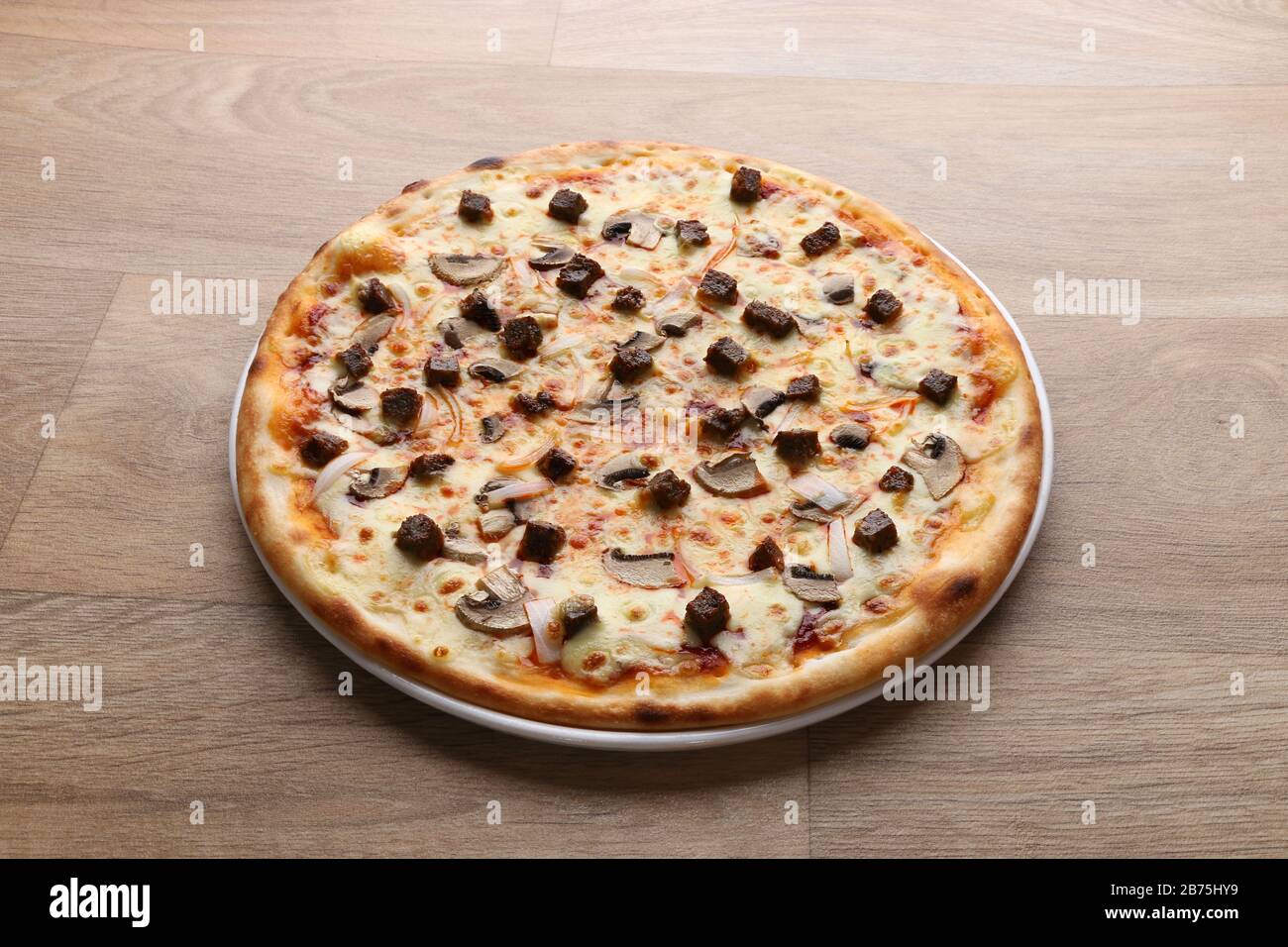 super supreme pizza - meat - mushroom pizza Stock Photo - Alamy