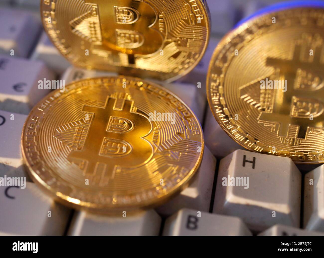 Bitcoin coins on computer hi-res stock photography and images - Alamy