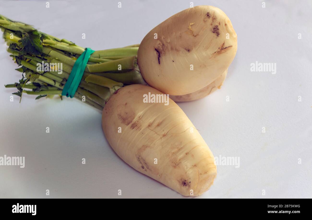 Bunch of turnips surrounded by white background Stock Photo - Alamy