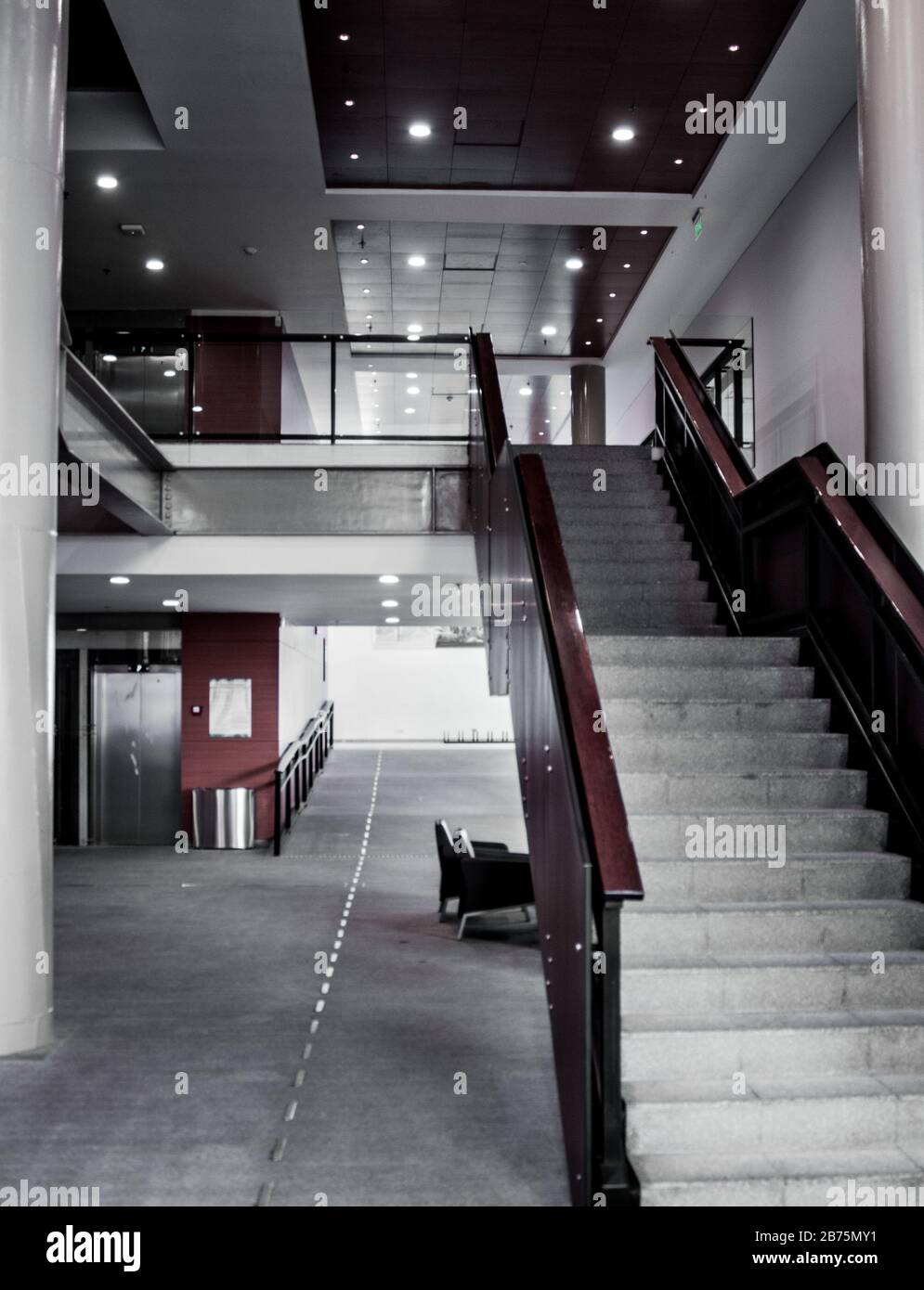 stairs and elevator in library Stock Photo - Alamy