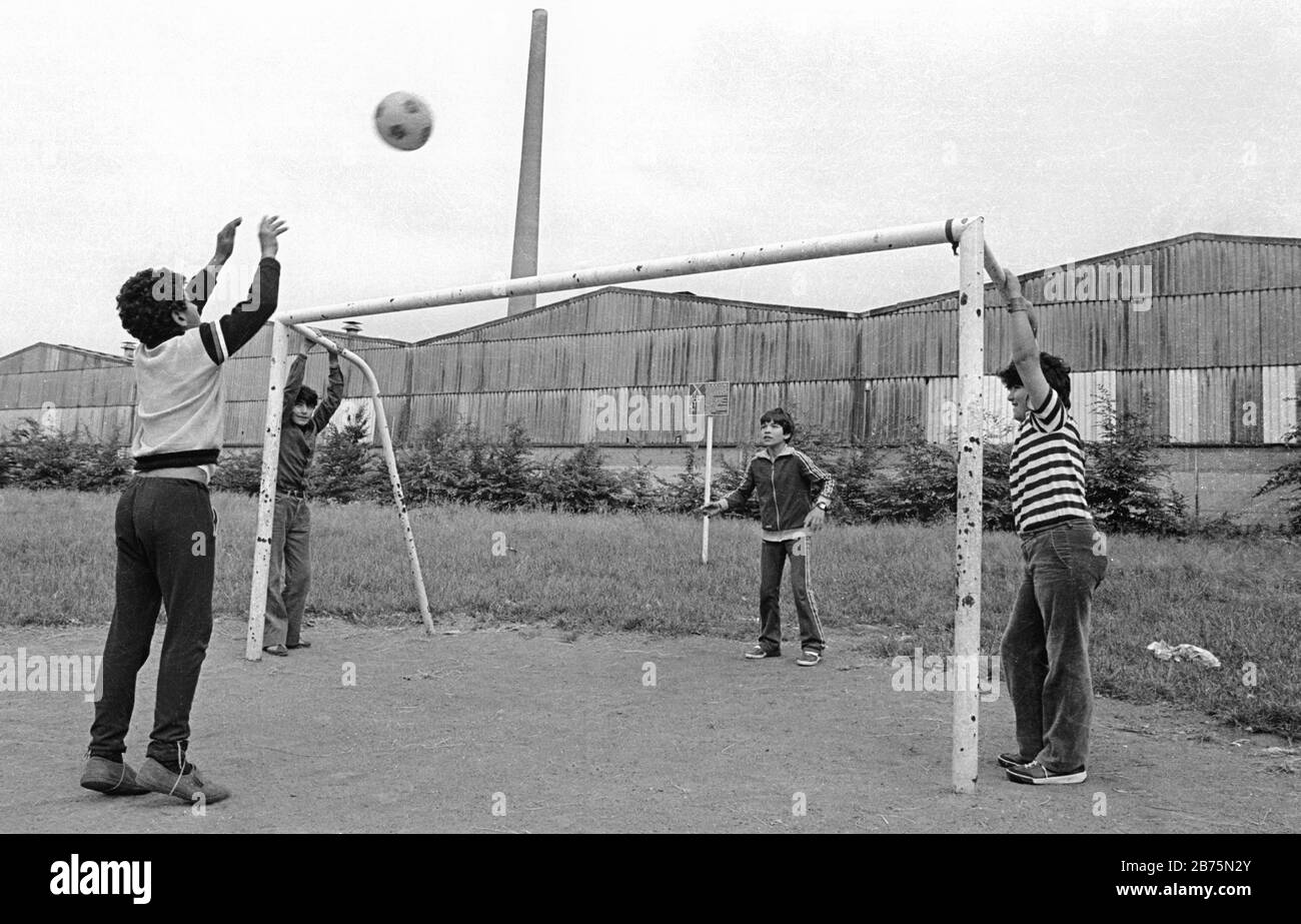 Turkish children playing football at a factory site, 16.04.1983 ...