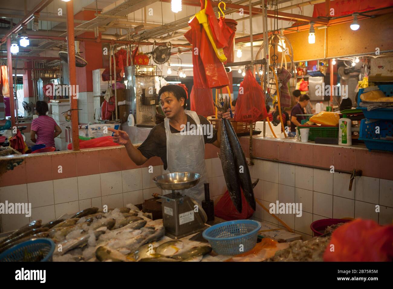 27.07.2017, Singapore, Republic of Singapore, Asia - A fish seller in ...
