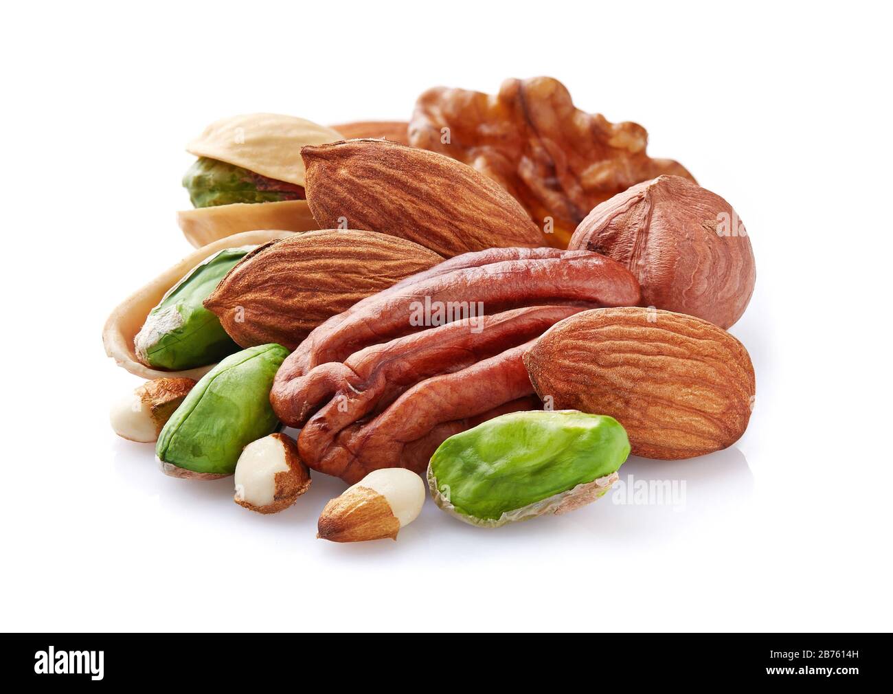 Nuts on a white background Stock Photo - Alamy