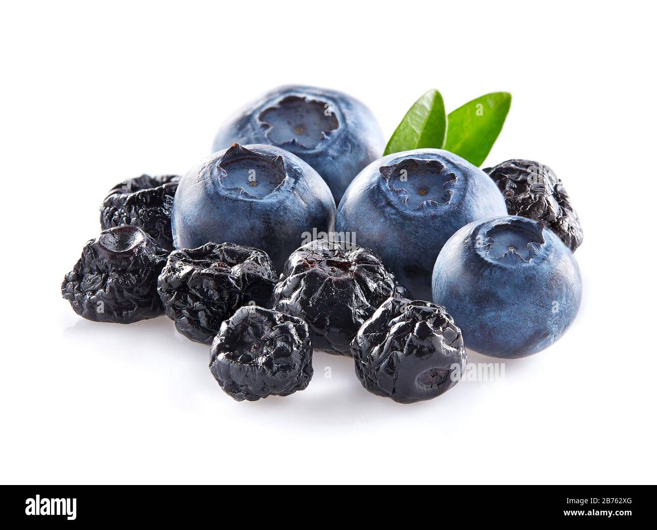 Blueberry with leaves fresh and dried Stock Photo - Alamy