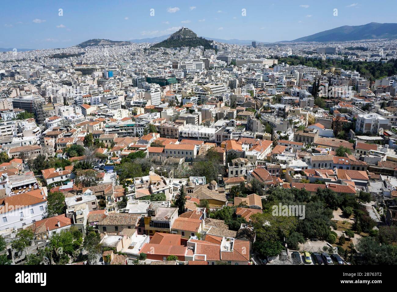View of Plaka, a district below the Acropolis with a view of Mount ...
