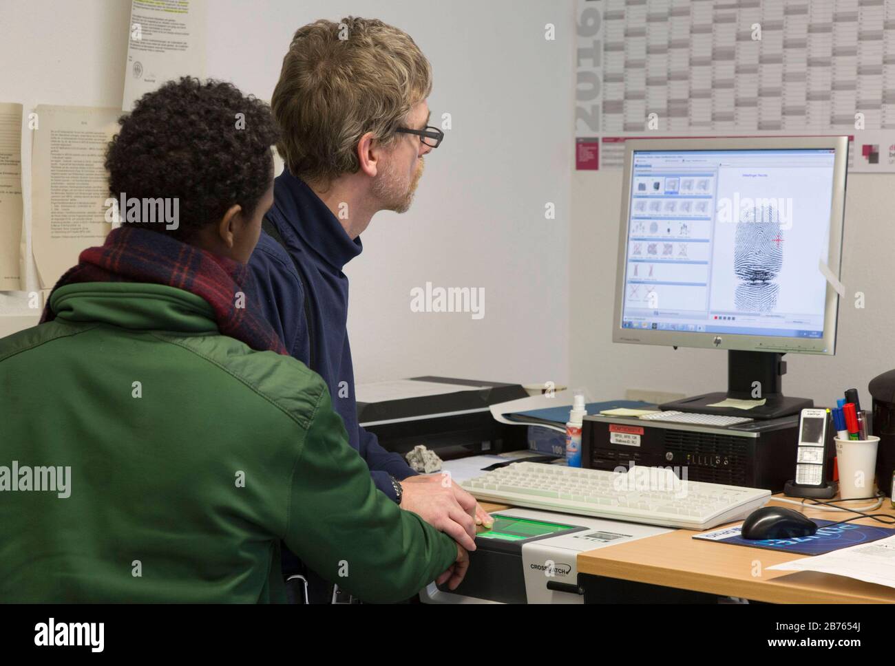 Fingerprint procedure hi-res stock photography and images - Alamy