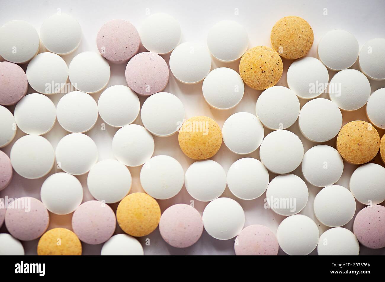 Vitamins and cellulose in the form of tablets.Pharmaceutics. Texture ...