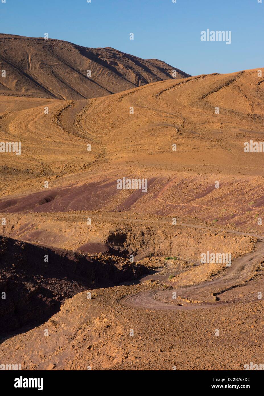 Curvy, layered sedimentary rocks of the moroccan Anti-Atlas Mountains ...