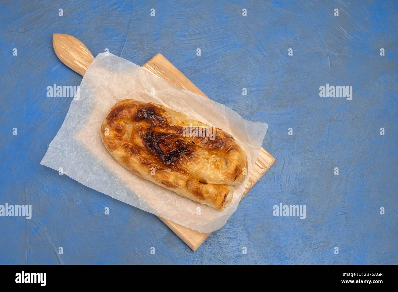 Top view of Bulgarian traditional cheese pie Banitsa (Banica, Banitza ...