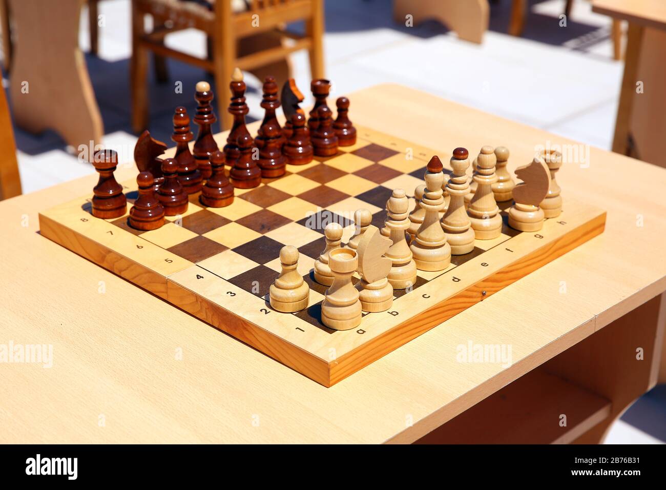 Yellow and brown photo with a picture of a chess Board pieces, Wooden ...