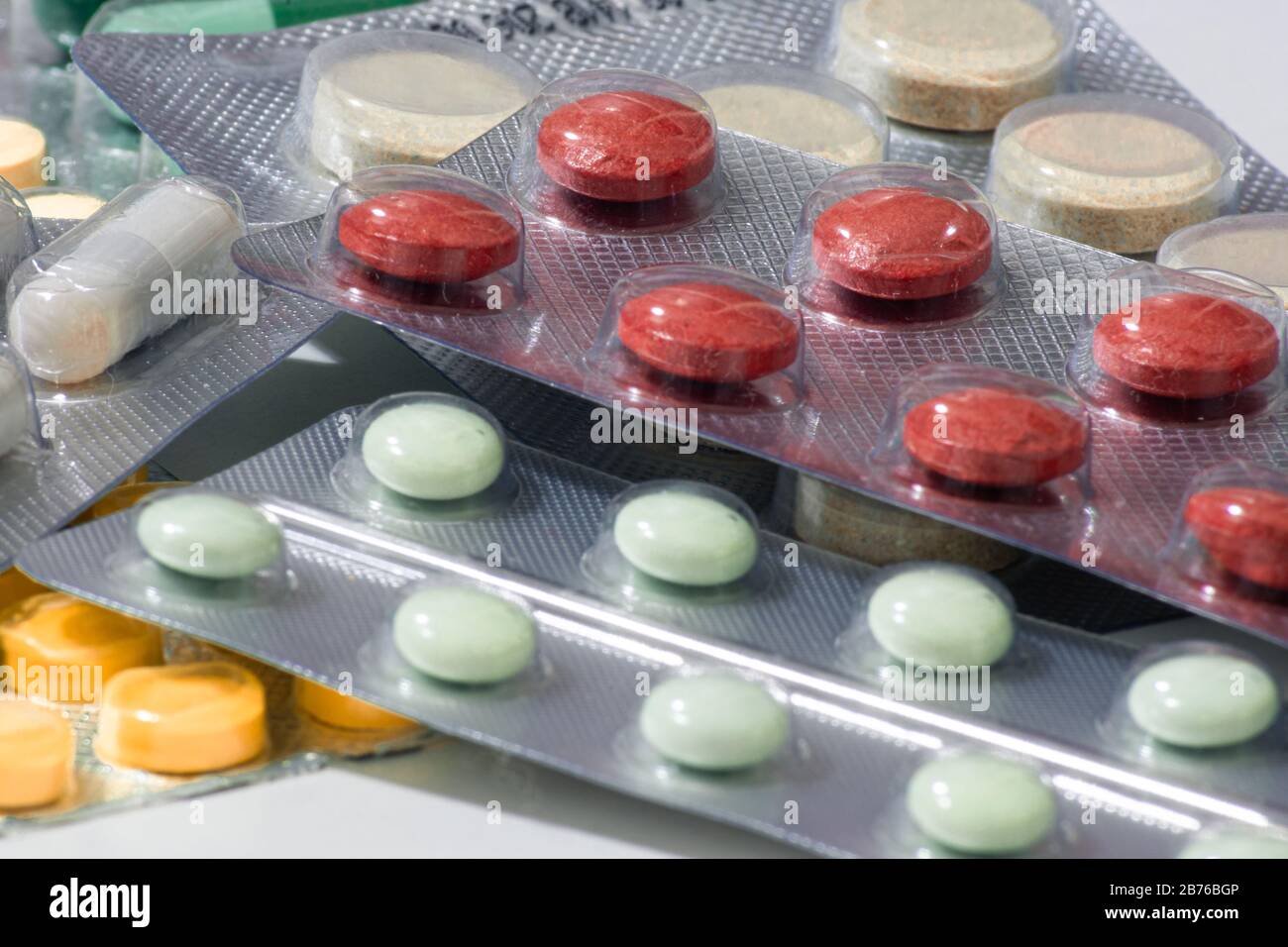 Medicine pills in many colors, form and dimensions Stock Photo - Alamy