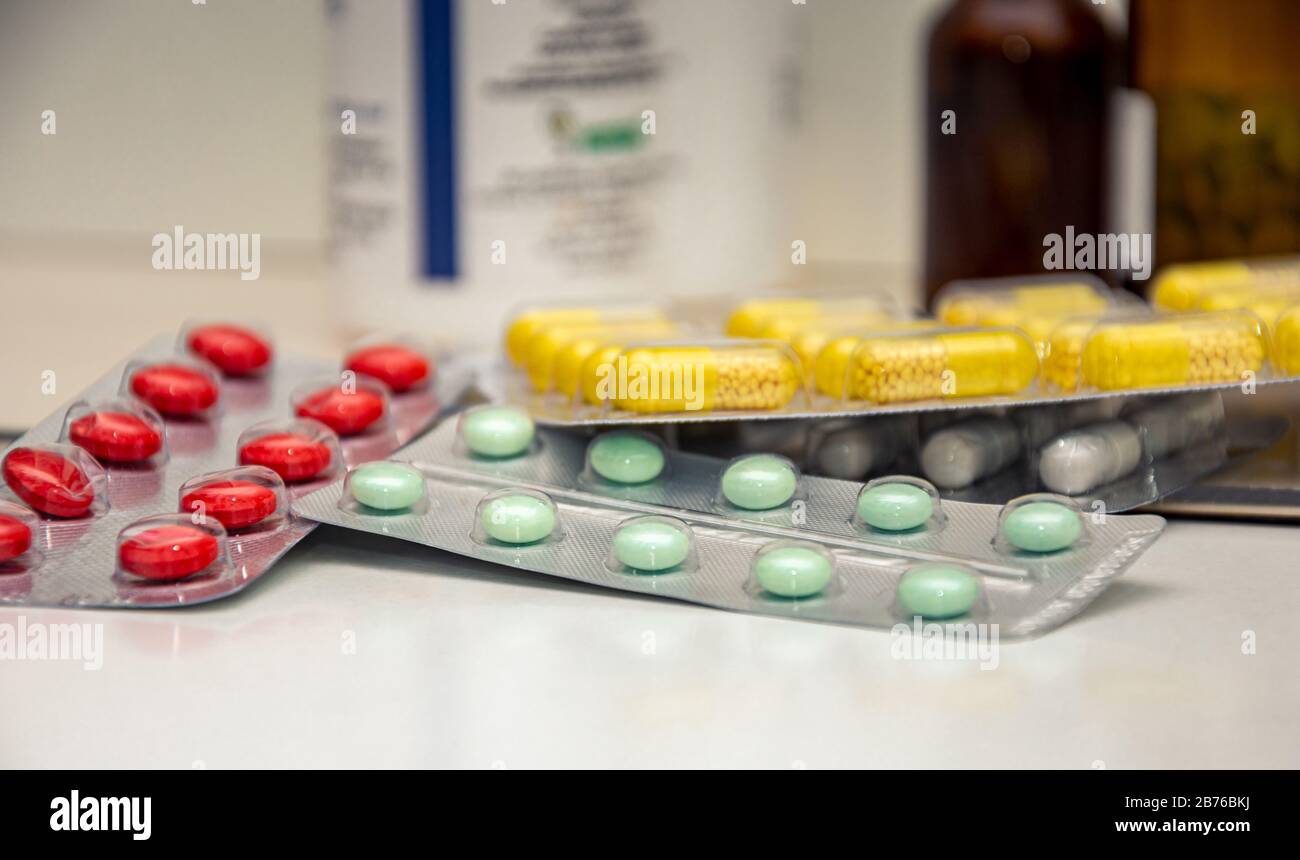 Tablets of different colors, form and dimensions Stock Photo - Alamy