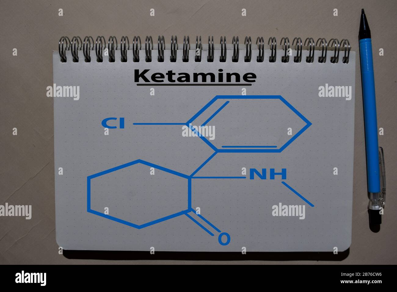 Ketamine write on a book. Structural chemical formula. Education ...