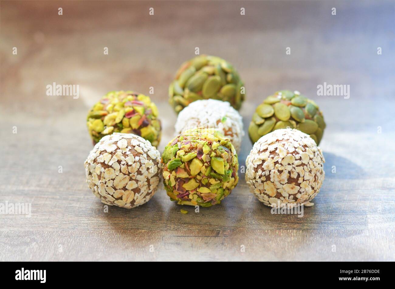 Close up of traditional Iraqi pastries, dates covered with pumpkin ...
