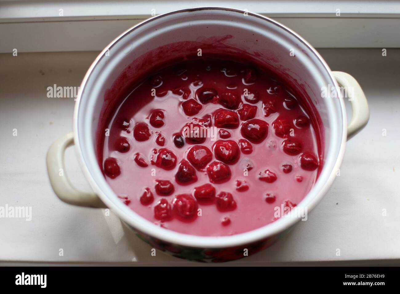 Homemade summer cherry soup in the kitchen Stock Photo - Alamy
