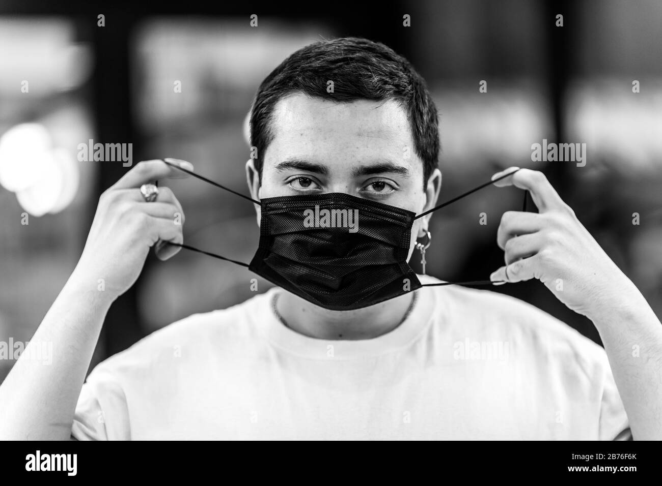 Person wearing a mask air pollution Black and White Stock Photos ...