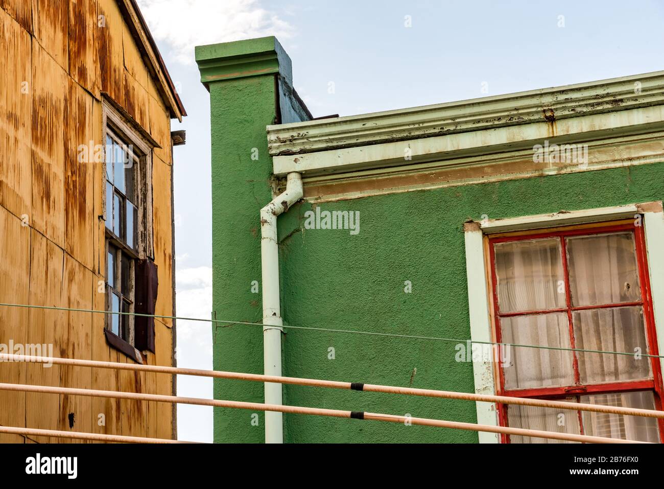 Architectonical detail of two very colorfull houses, a material house ...