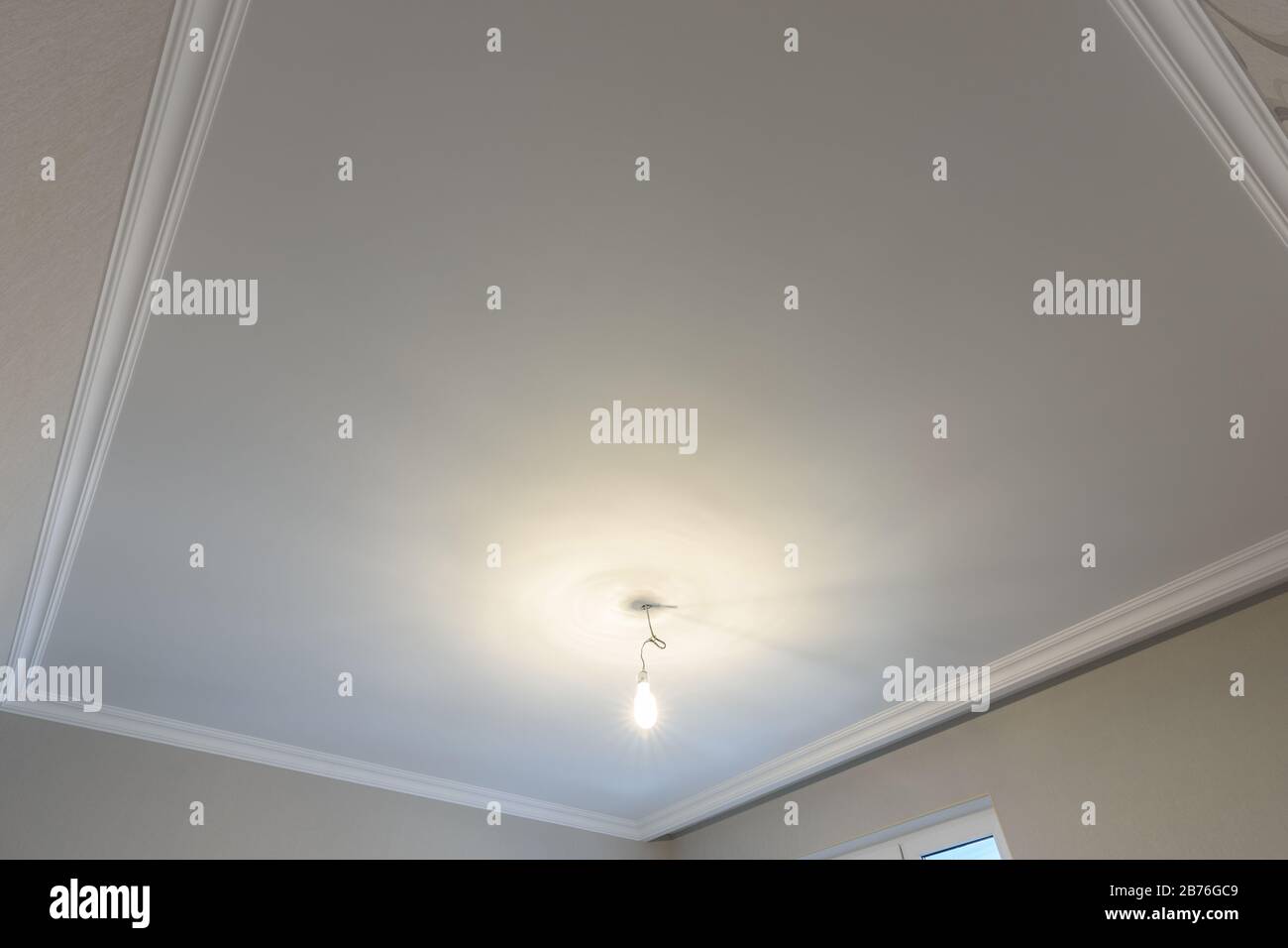 Plastered ceilings in the room after renovation Stock Photo - Alamy