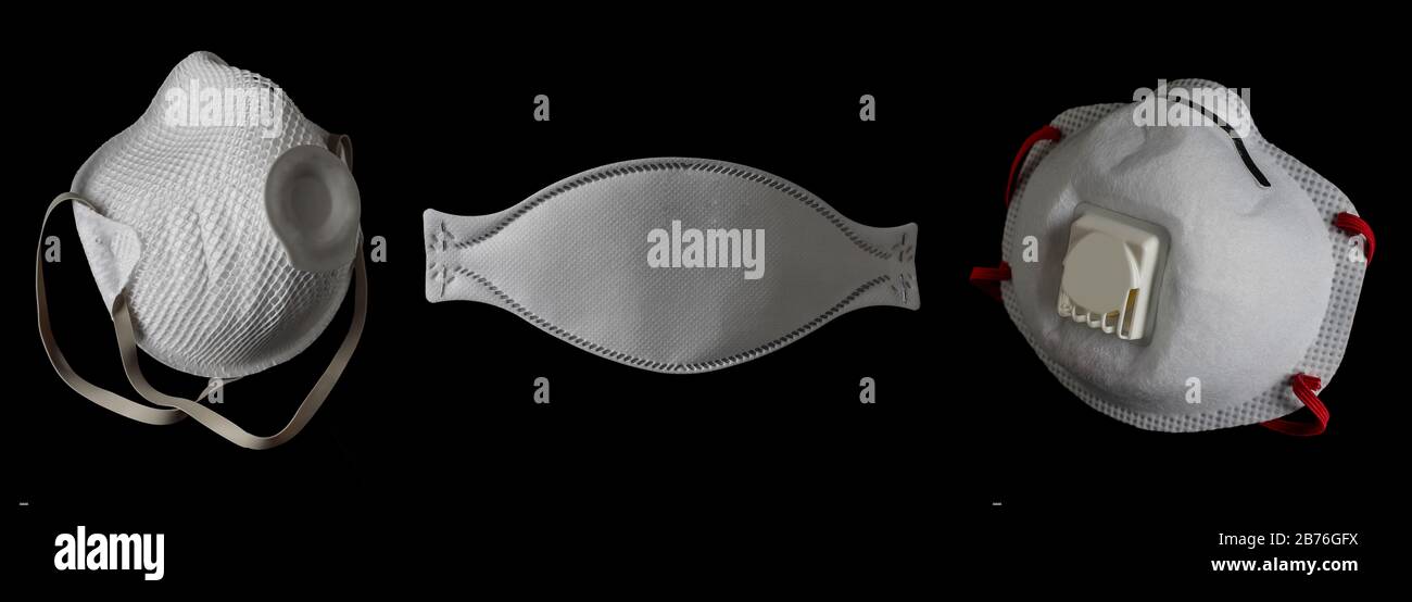 horizontal view on foreground of three different safety masks isolated ...