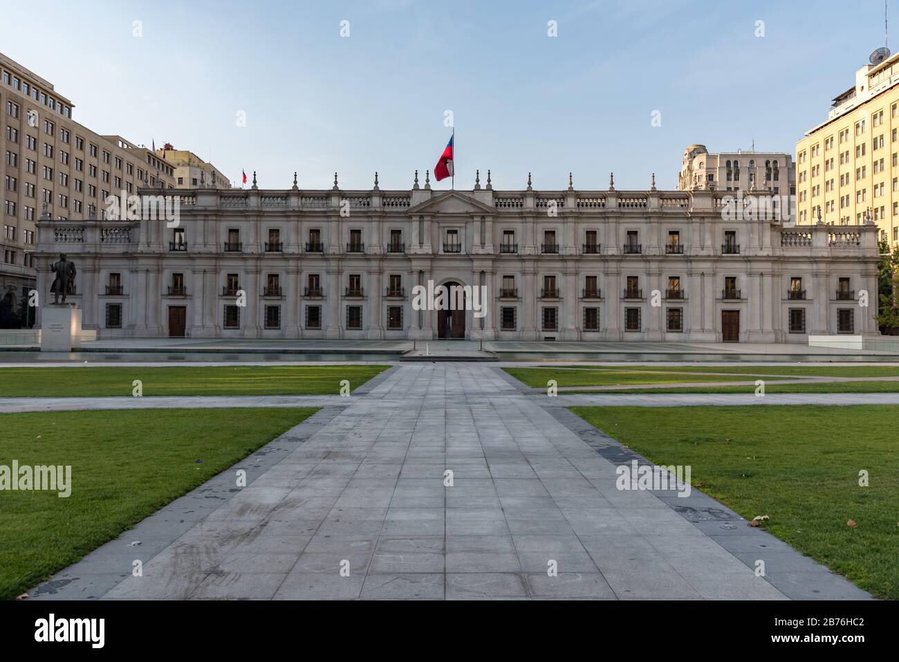 The front of La Moneda, house of government of Chile with a flaming ...