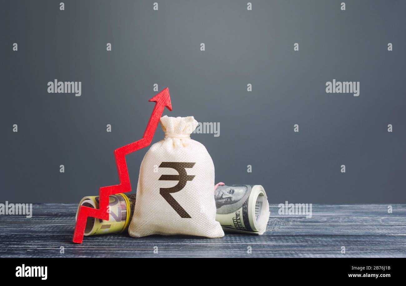 Indian rupee money bag and red arrow up. Influx of investment and ...