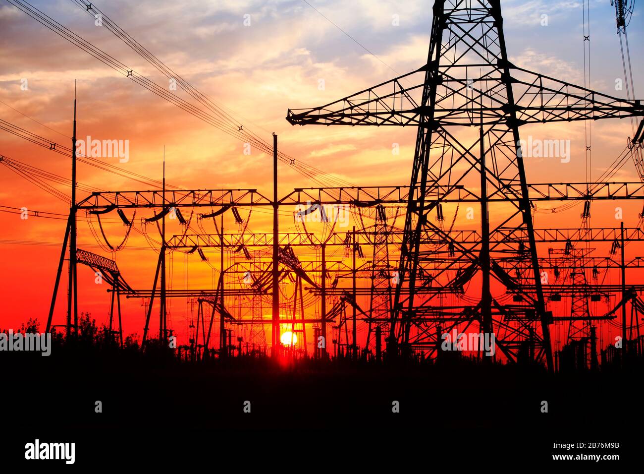 The power supply facilities of contour in the evening Stock Photo - Alamy