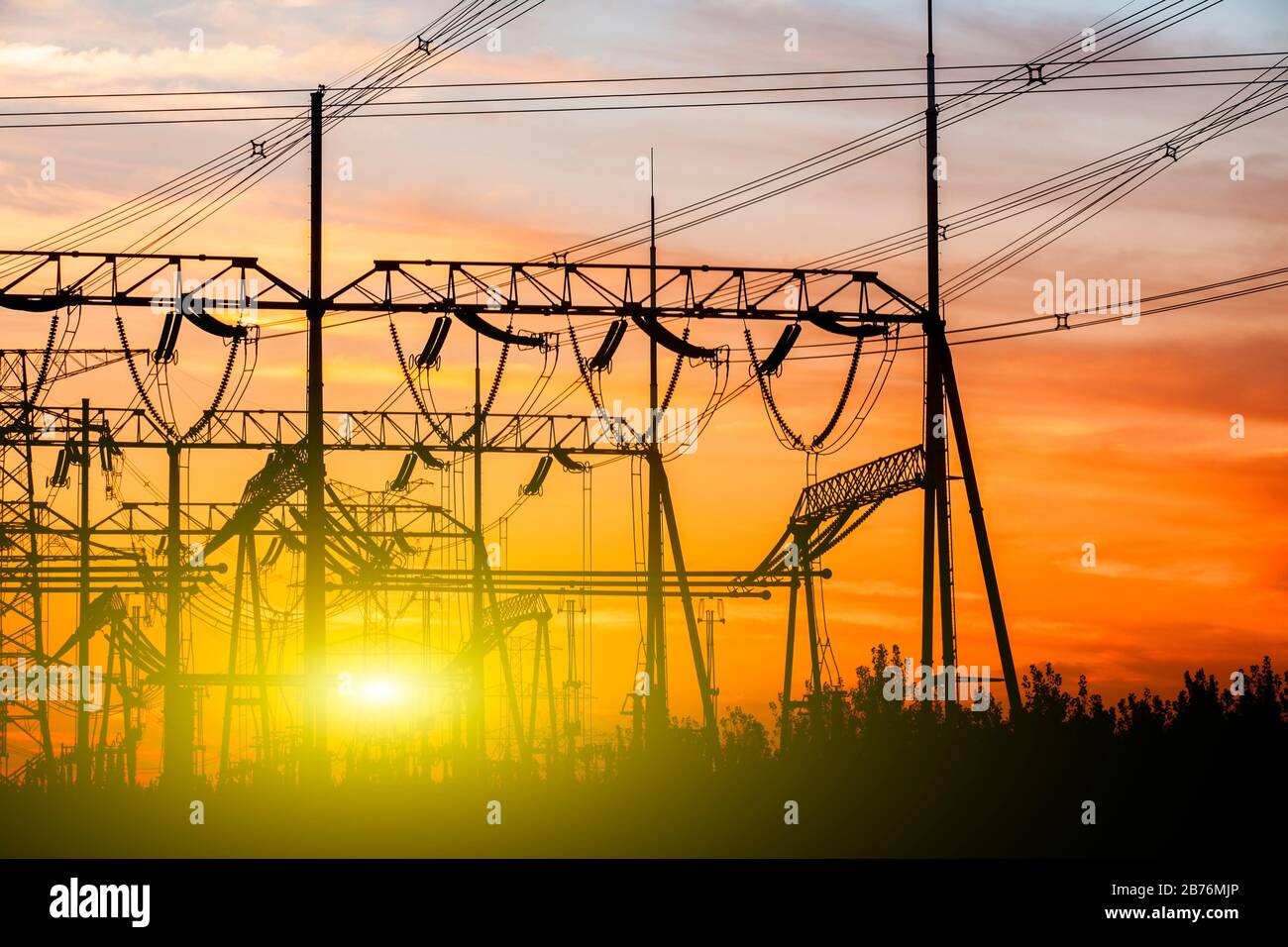 The power supply facilities of contour in the evening Stock Photo - Alamy