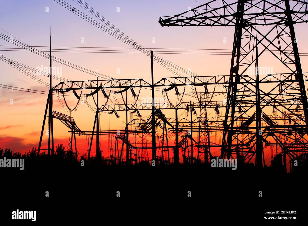 The power supply facilities of contour in the evening Stock Photo - Alamy