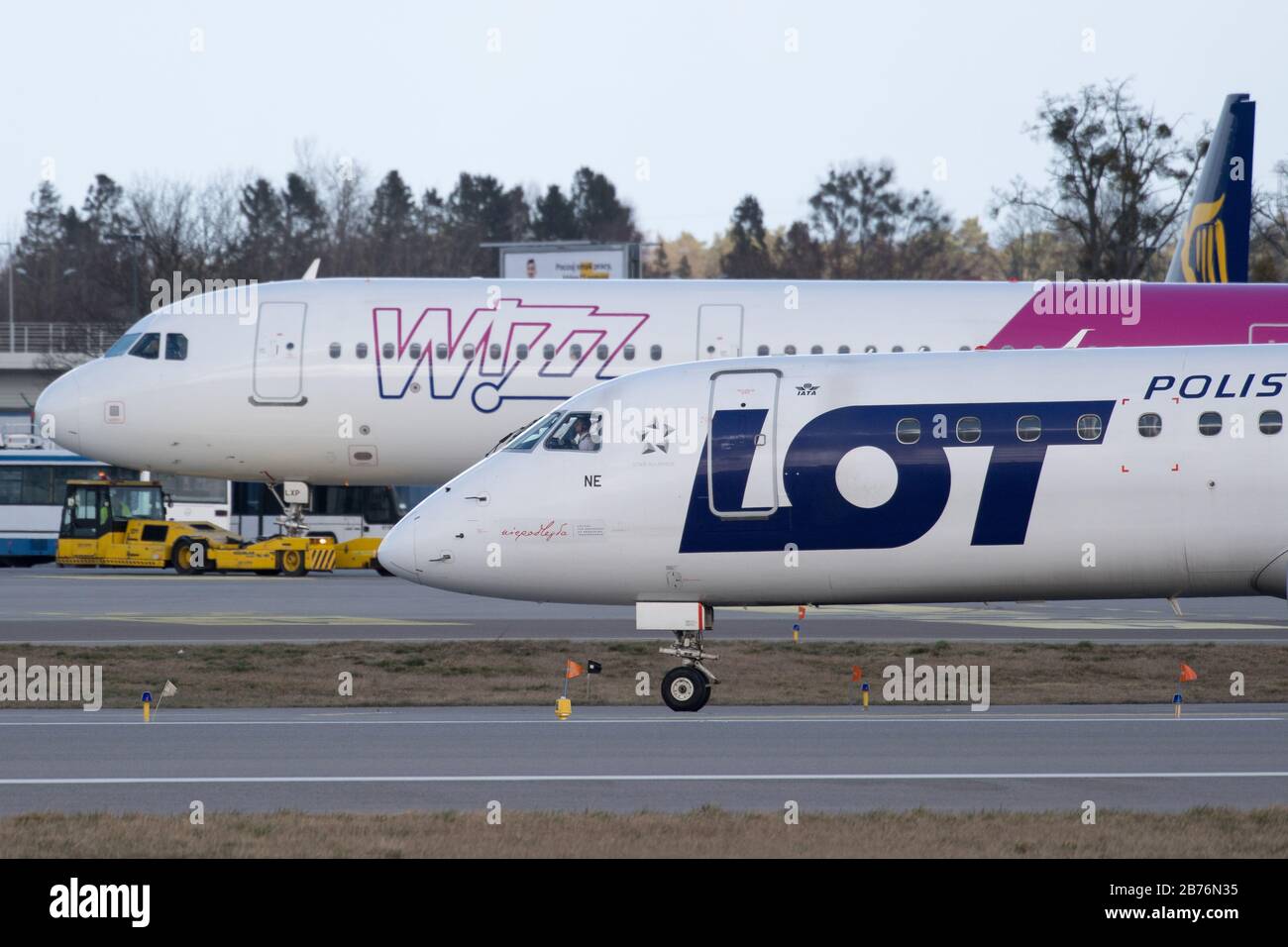 Embraer E195LR of Polskie Linie Lotnicze LOT and Airbus A320 200 of Wizzair in Gdansk, Poland ...