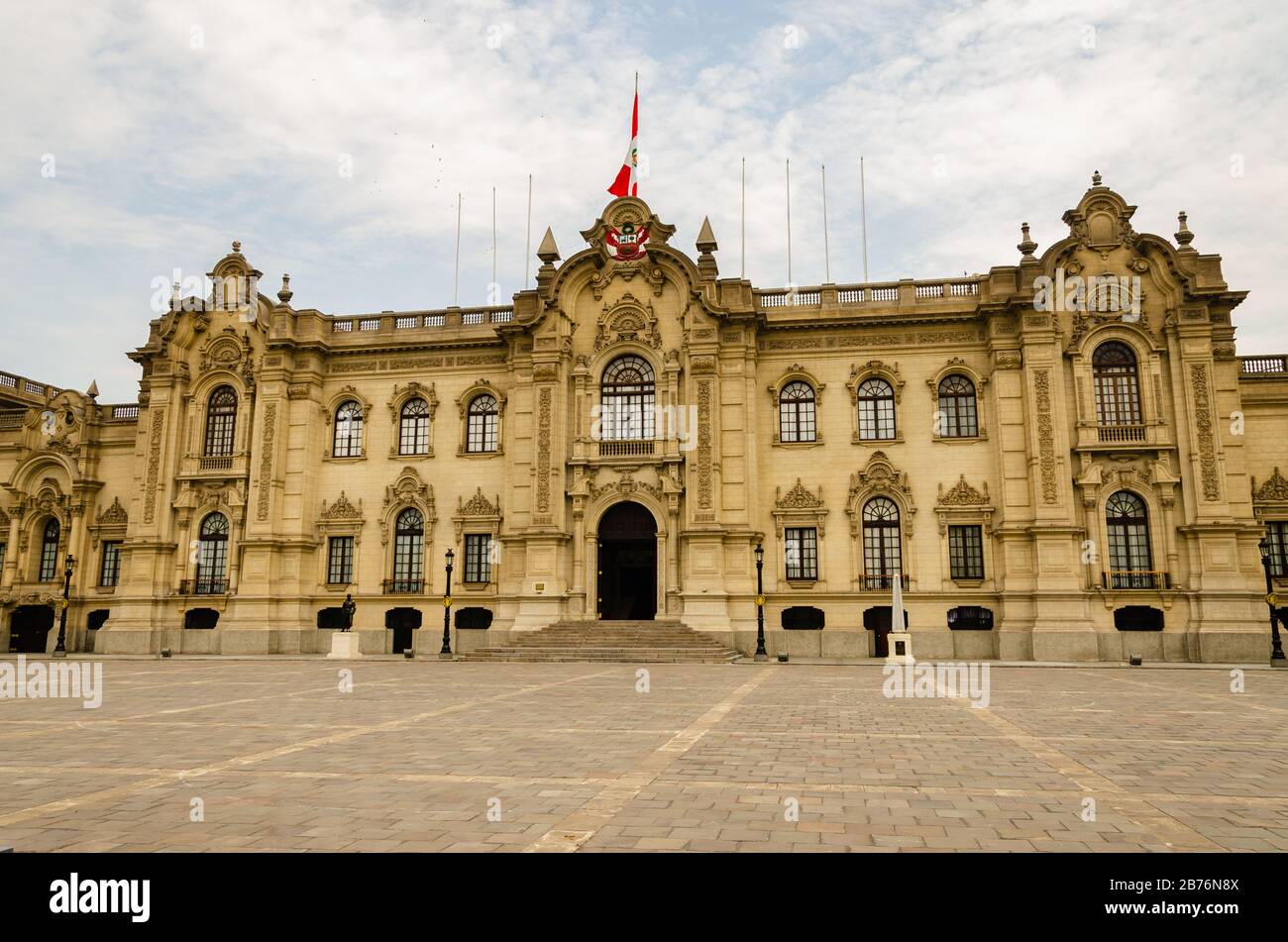 Facade of the Presidential Palace of Peru with waving flag Stock Photo ...