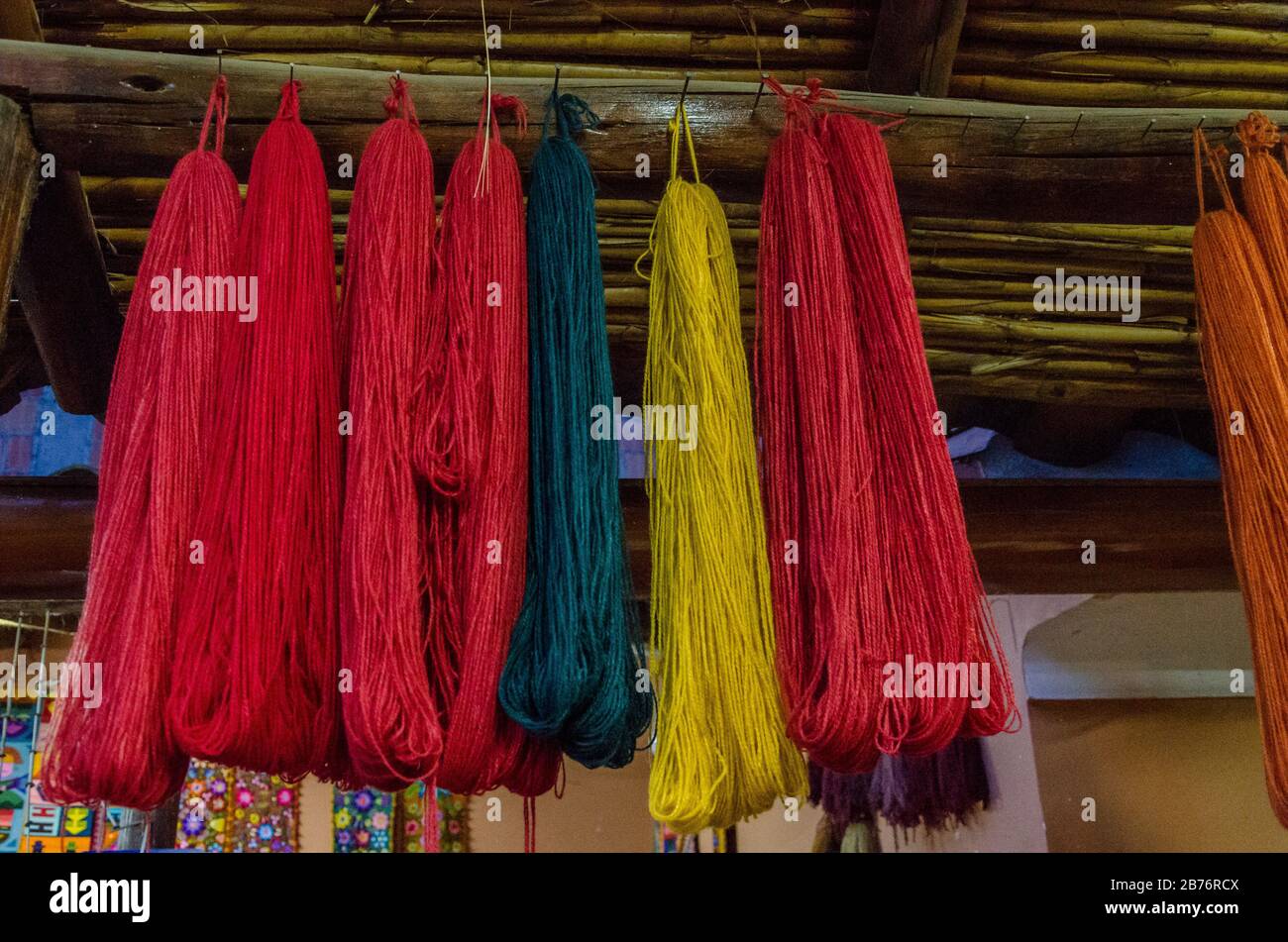 Sheep wool spun and dyed manually with natural dyes in Chincheros, Peru ...