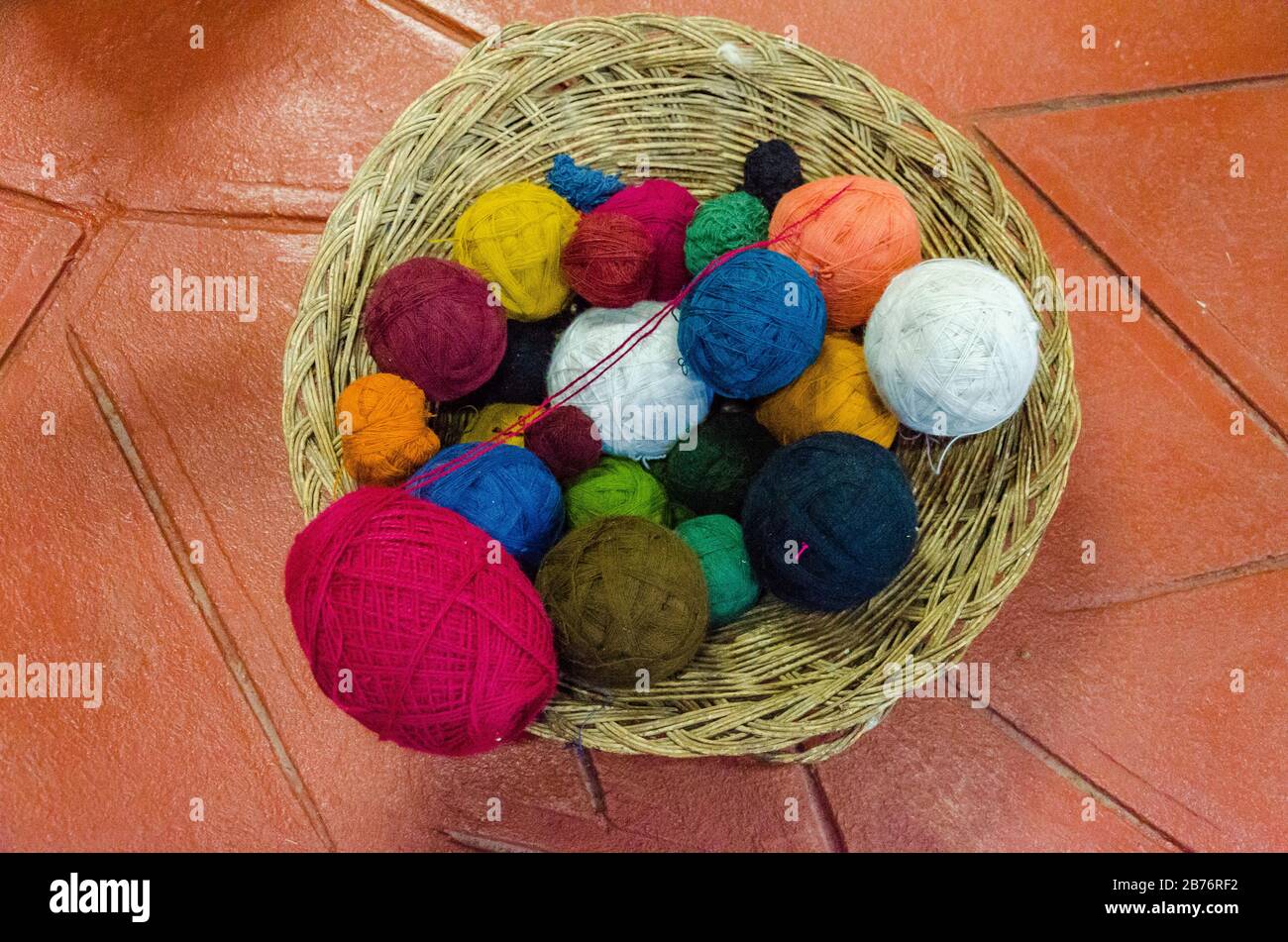 Sheep wool spun and dyed manually with natural dyes in Chincheros, Peru ...