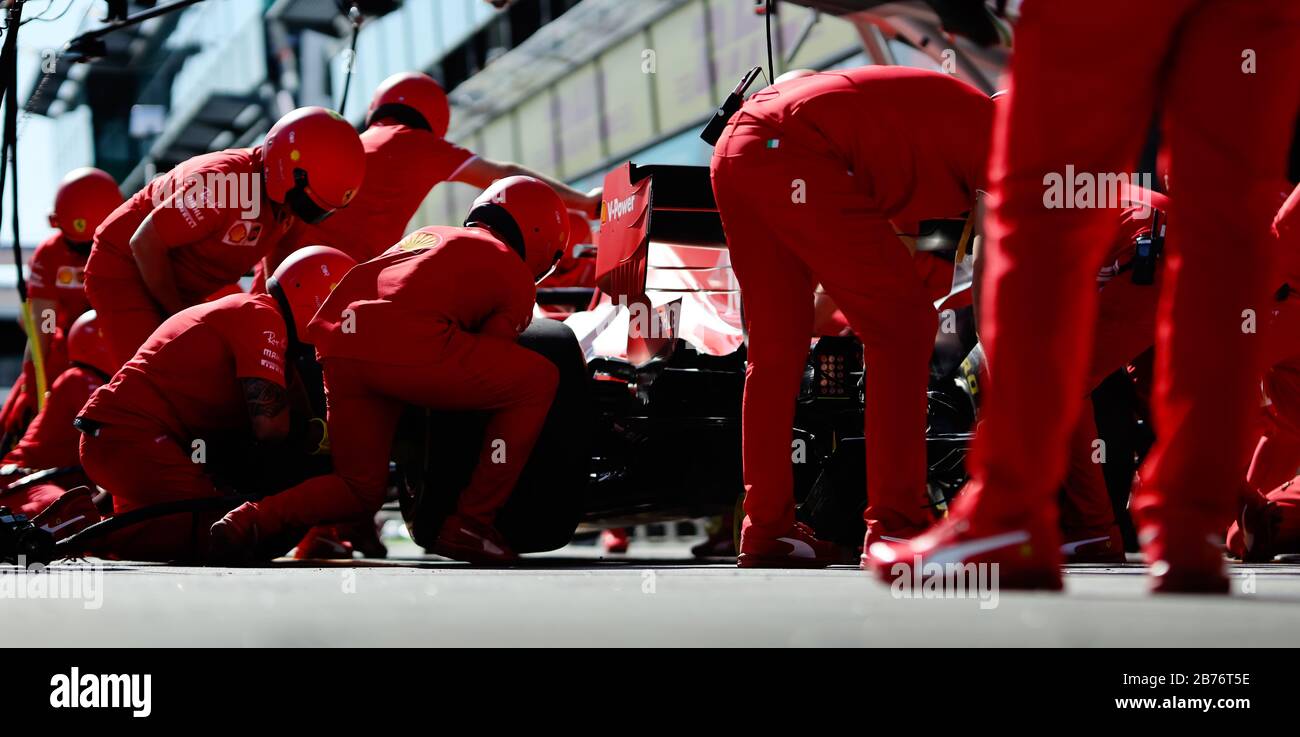 Team Ferrari rehearse a pit lane tyre change ahead of the Australian ...