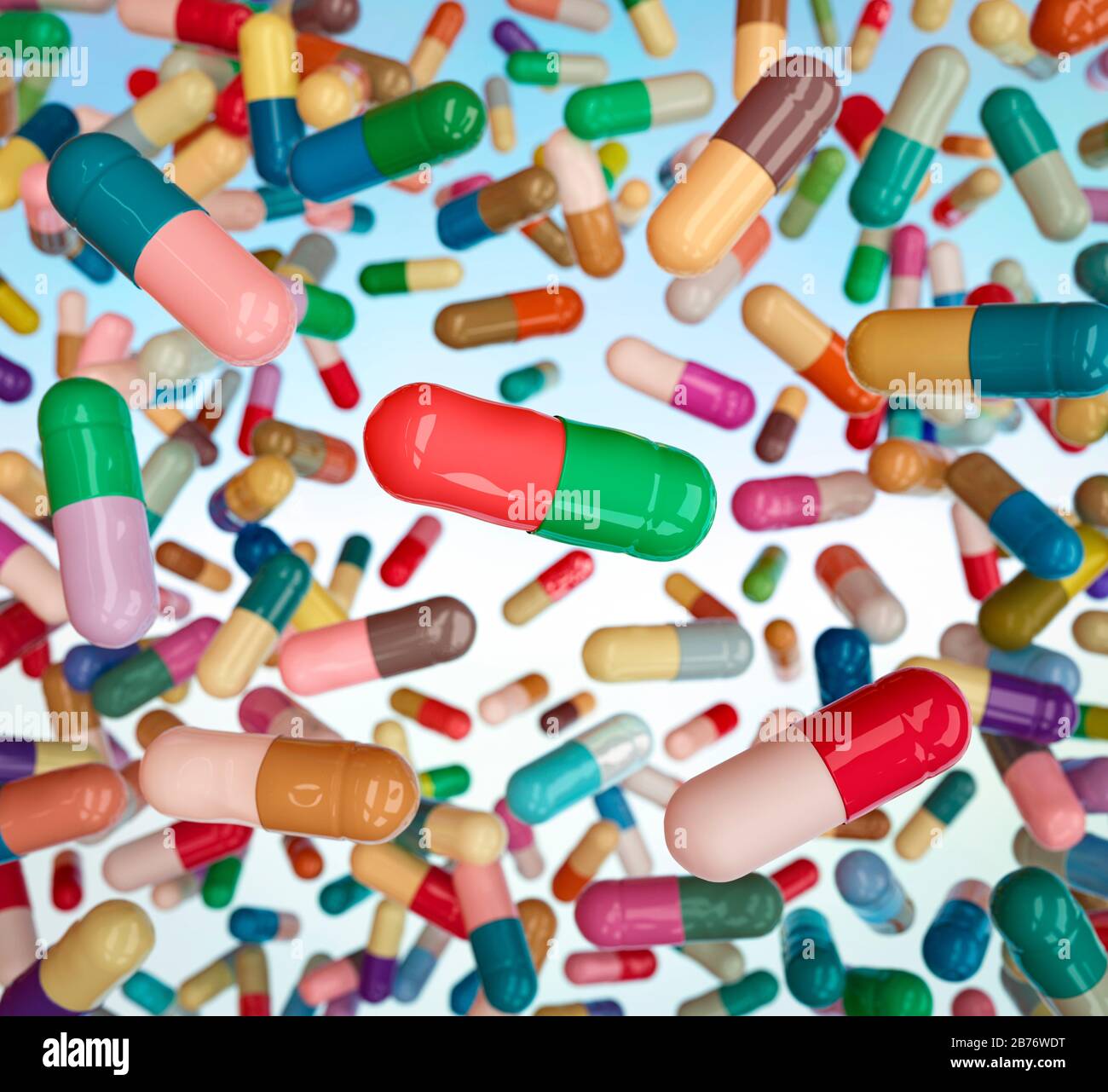 Hundreds of medical capsules floating and falling Stock Photo - Alamy