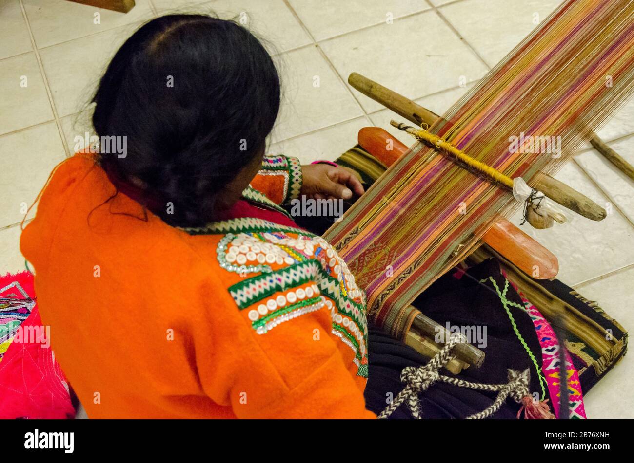 Indigenous woman weaving cloth hi-res stock photography and images - Alamy