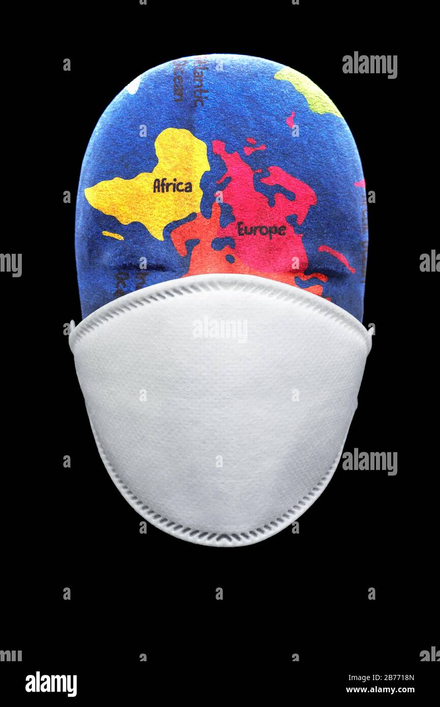 Health mask depicting global pandemic breakout in the world Stock Photo ...