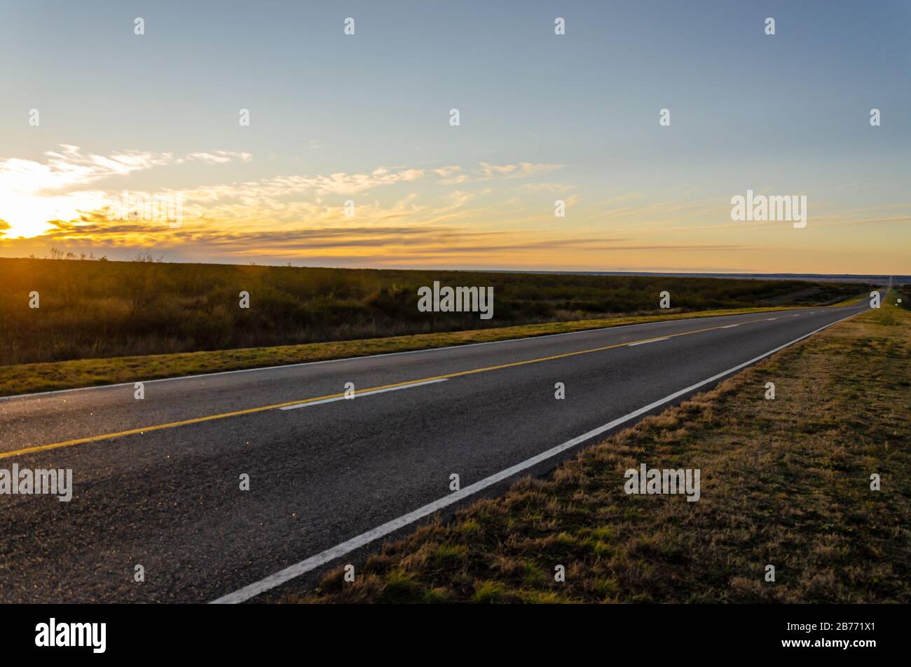Route landscape on sunset in plane geography Stock Photo - Alamy