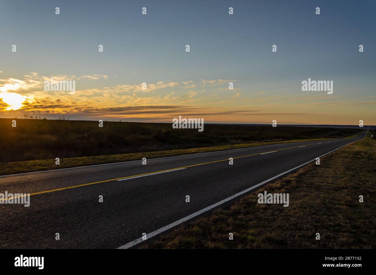 Route landscape on sunset in plane geography Stock Photo - Alamy