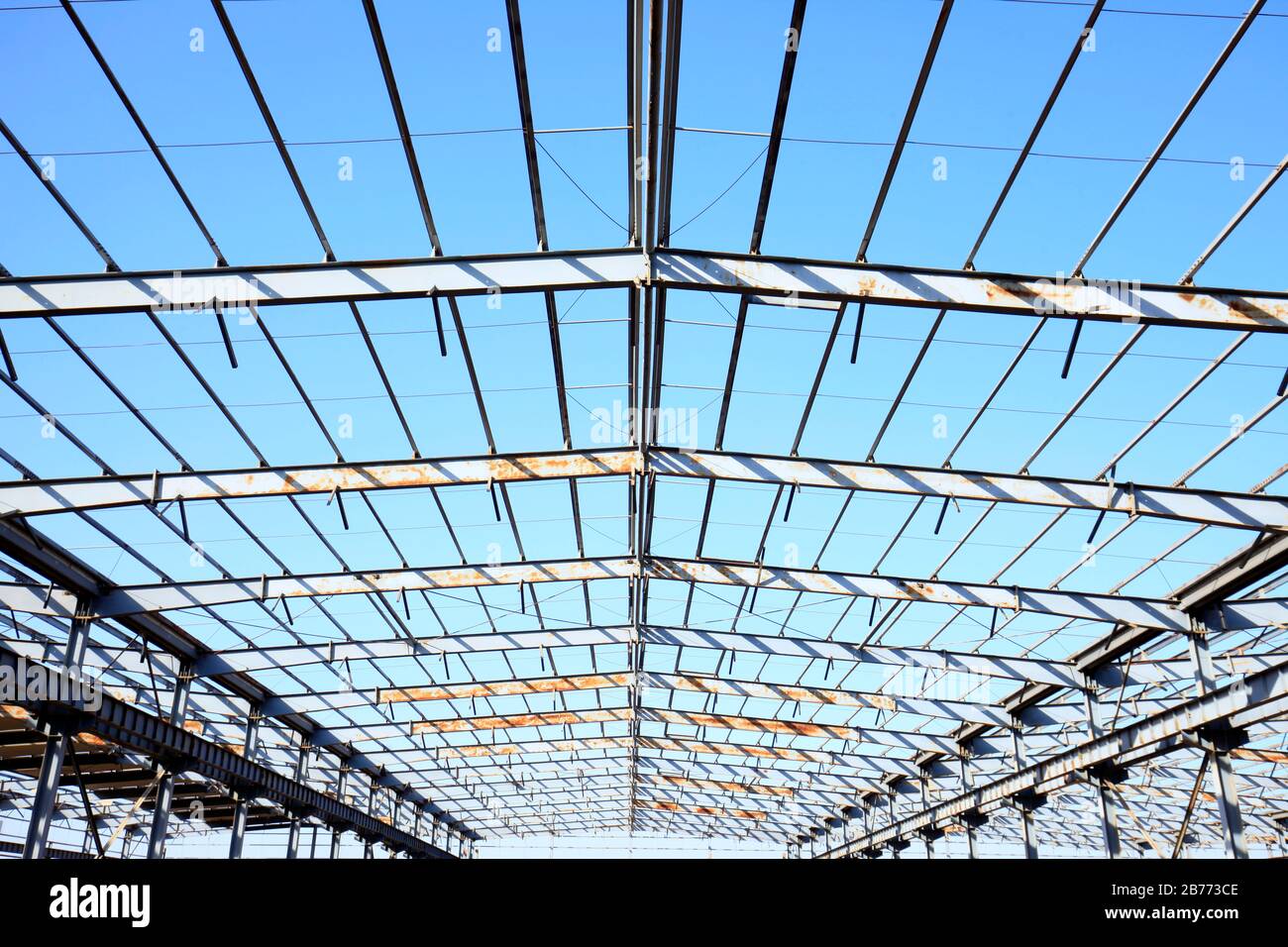 Steel frame structure at construction site Stock Photo - Alamy