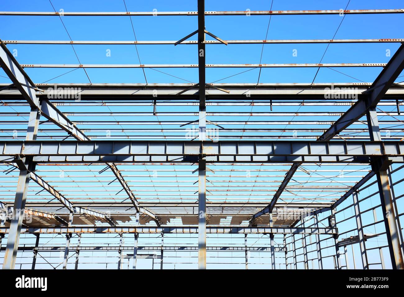 Steel frame structure at construction site Stock Photo - Alamy