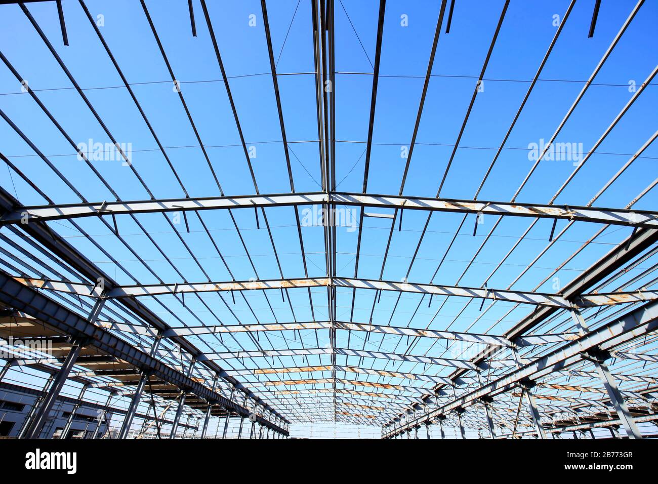 Steel frame structure at construction site Stock Photo - Alamy