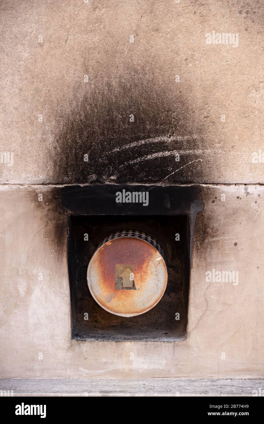 Back of a gas heater or stove that burn and stain the wall with soot ...
