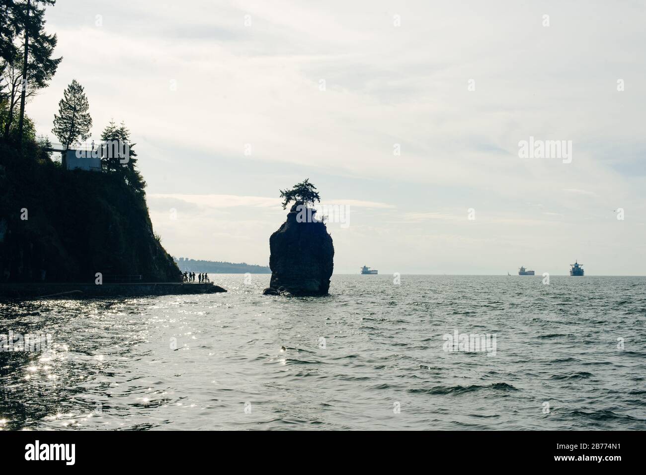 Siwash Rock, a famous rock outcropping in Vancouver, British Columbia ...