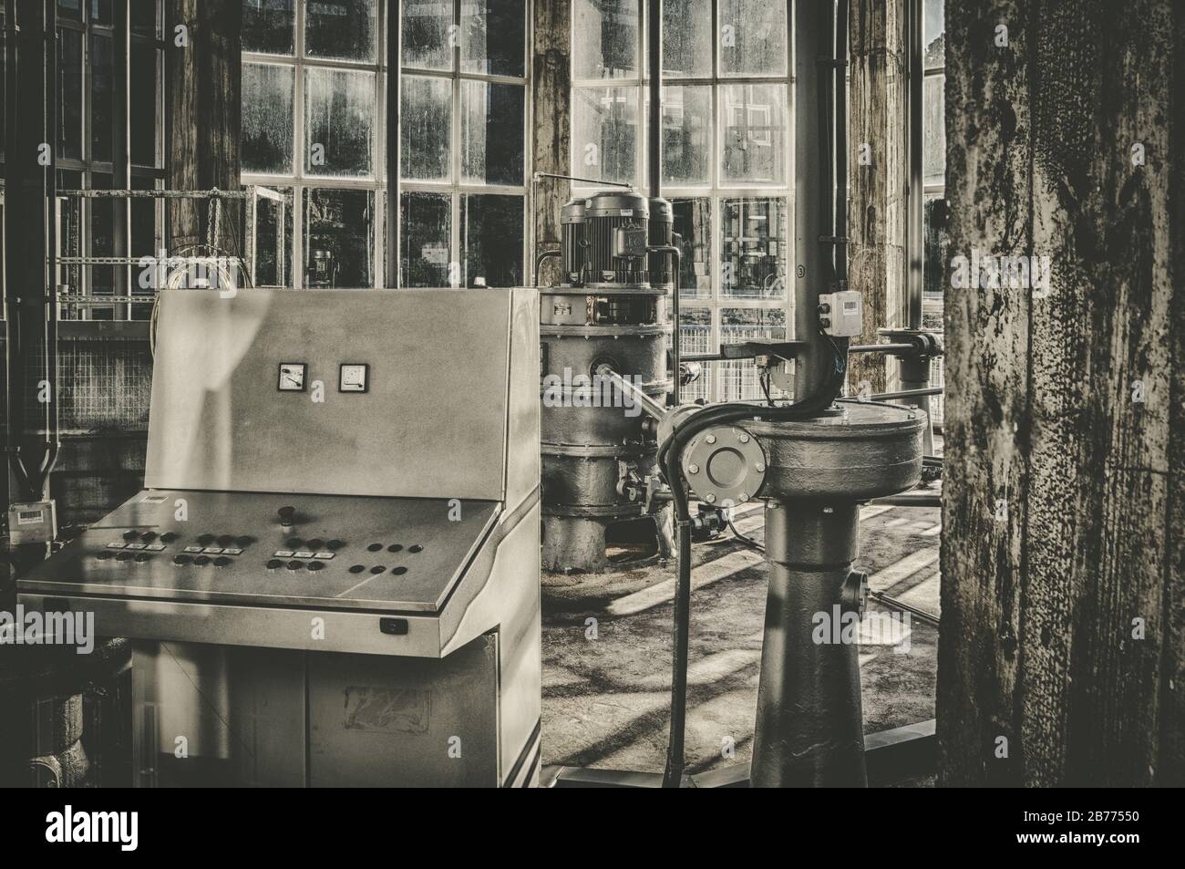 Inside of an old factory with mechanisms Stock Photo - Alamy