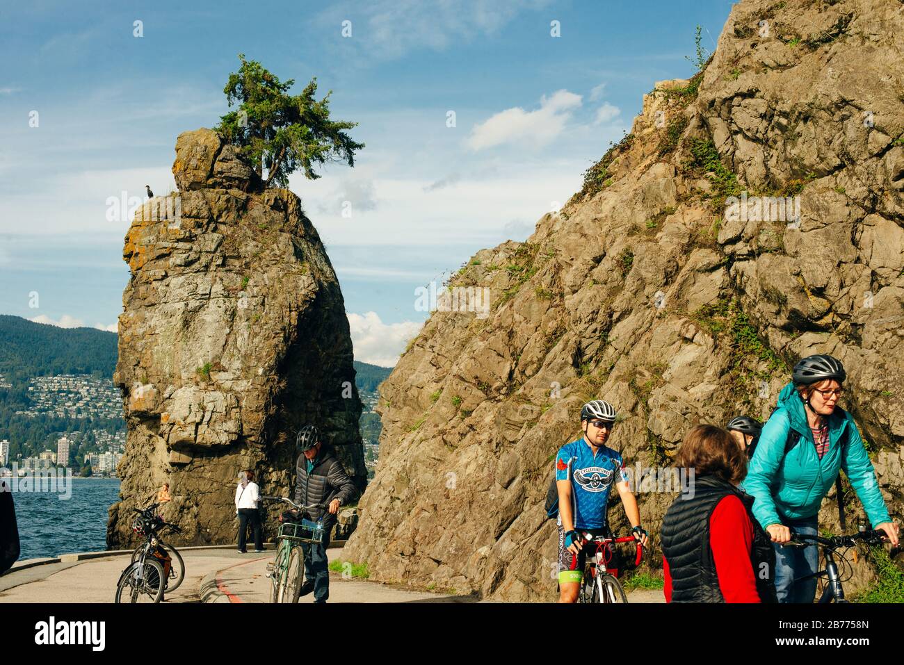 Siwash Rock, a famous rock outcropping in Vancouver, British Columbia ...